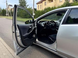 Grey Honda Civic 2016 in Vilnius, with an engine capacity of 1.80 L and mileage of 180 thousand km for 8450 €, photo 30 on AUTOMOTO.COM.LV