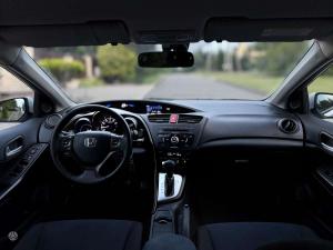 Grey Honda Civic 2016 in Vilnius, with an engine capacity of 1.80 L and mileage of 180 thousand km for 8450 €, photo 40 on AUTOMOTO.COM.LV