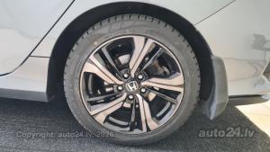 Grey Honda Civic 2020 in Tartu, with an engine capacity of 1.00 L and mileage of 174 thousand km for 11900 €, photo 25 on AUTOMOTO.COM.LV