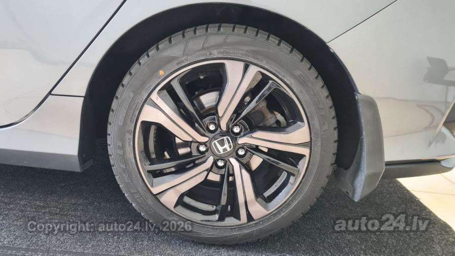 Grey Honda Civic 2020 in Tartu, with an engine capacity of 1.00 L and mileage of 174 thousand km for 11900 €, photo 25 on AUTOMOTO.COM.LV