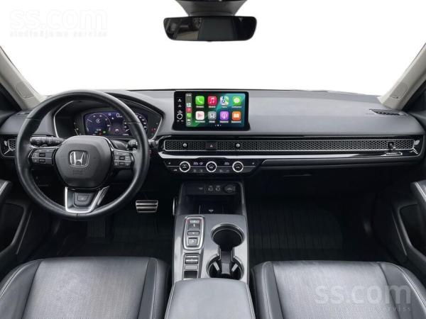 Grey Honda Civic 2023 in Riga, with an engine capacity of 2.00 L and mileage of 50 thousand km for 26990 €, photo 8 on AUTOMOTO.COM.LV