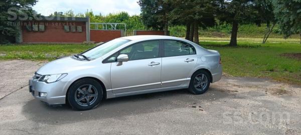 Grey Honda Civic 2007 in Jelgava, with an engine capacity of 1.40 L and mileage of 246 thousand km for 2100 €, photo 4 on AUTOMOTO.COM.LV