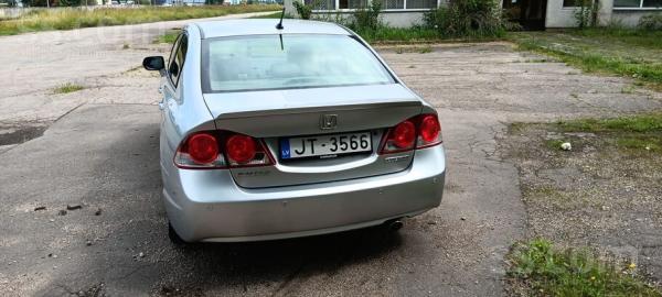 Grey Honda Civic 2007 in Jelgava, with an engine capacity of 1.40 L and mileage of 246 thousand km for 2100 €, photo 8 on AUTOMOTO.COM.LV