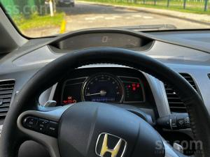 Pelēks Honda Civic 2007 Rīga, ar dzinēja tilpumu 1.80 L un nobraukumu 288 tūkst. km par 1000 €, foto 6 vietnē AUTOMOTO.COM.LV