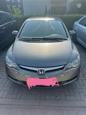 Grey Honda Civic 2007 in Kaunas, with an engine capacity of 1.34 L and mileage of 301 thousand km for 1350 €, photo 4 on AUTOMOTO.COM.LV