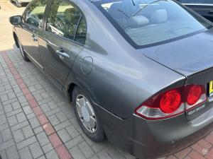 Grey Honda Civic 2007 in Kaunas, with an engine capacity of 1.34 L and mileage of 301 thousand km for 1350 €, photo 7 on AUTOMOTO.COM.LV