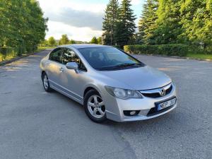 Grey Honda Civic 2009 in Panevezys, with an engine capacity of 1.34 L and mileage of 328 thousand km for 3200 €, photo 11 on AUTOMOTO.COM.LV