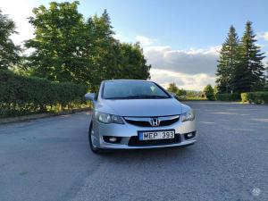 Grey Honda Civic 2009 in Panevezys, with an engine capacity of 1.34 L and mileage of 328 thousand km for 3200 €, photo 12 on AUTOMOTO.COM.LV