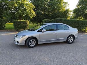 Grey Honda Civic 2009 in Panevezys, with an engine capacity of 1.34 L and mileage of 328 thousand km for 3200 €, photo 13 on AUTOMOTO.COM.LV