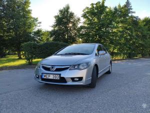 Grey Honda Civic 2009 in Panevezys, with an engine capacity of 1.34 L and mileage of 328 thousand km for 3200 €, photo 14 on AUTOMOTO.COM.LV