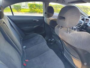 Grey Honda Civic 2009 in Panevezys, with an engine capacity of 1.34 L and mileage of 328 thousand km for 3200 €, photo 16 on AUTOMOTO.COM.LV