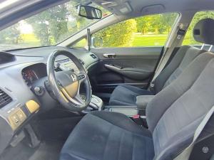 Grey Honda Civic 2009 in Panevezys, with an engine capacity of 1.34 L and mileage of 328 thousand km for 3200 €, photo 19 on AUTOMOTO.COM.LV