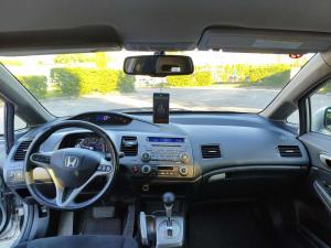 Grey Honda Civic 2009 in Panevezys, with an engine capacity of 1.34 L and mileage of 328 thousand km for 3200 €, photo 21 on AUTOMOTO.COM.LV
