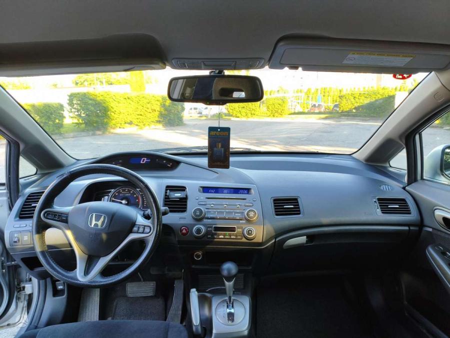 Grey Honda Civic 2009 in Panevezys, with an engine capacity of 1.34 L and mileage of 328 thousand km for 3200 €, photo 21 on AUTOMOTO.COM.LV