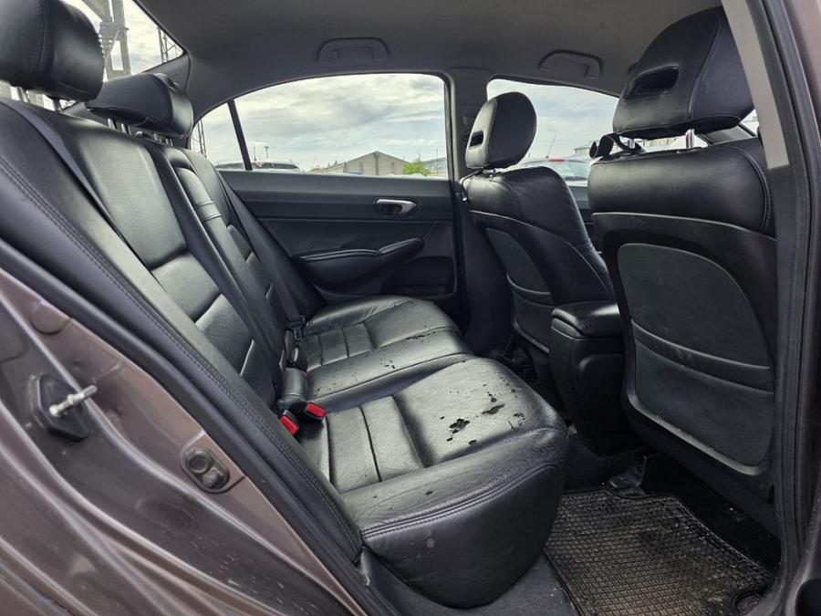 Grey Honda Civic 2009 in Tallinn, with an engine capacity of 1.30 L and mileage of 292 thousand km for 1199 €, photo 13 on AUTOMOTO.COM.LV
