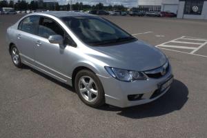 Grey Honda Civic 2009 in Panevezys, with an engine capacity of 1.34 L and mileage of 301 thousand km for 1750 €, photo  on AUTOMOTO.COM.LV