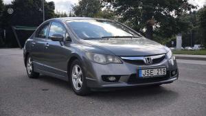 Grey Honda Civic 2010 in Vilnius, with an engine capacity of 1.40 L and mileage of 254 thousand km for 3300 €, photo 5 on AUTOMOTO.COM.LV