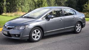 Grey Honda Civic 2010 in Vilnius, with an engine capacity of 1.40 L and mileage of 254 thousand km for 3300 €, photo 8 on AUTOMOTO.COM.LV