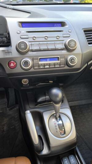 Grey Honda Civic 2010 in Vilnius, with an engine capacity of 1.40 L and mileage of 254 thousand km for 3300 €, photo 12 on AUTOMOTO.COM.LV