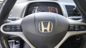Grey Honda Civic 2010 in Vilnius, with an engine capacity of 1.40 L and mileage of 254 thousand km for 3300 €, photo 14 on AUTOMOTO.COM.LV