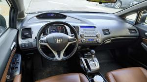 Grey Honda Civic 2010 in Vilnius, with an engine capacity of 1.40 L and mileage of 254 thousand km for 3300 €, photo 18 on AUTOMOTO.COM.LV