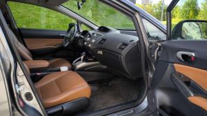 Grey Honda Civic 2010 in Vilnius, with an engine capacity of 1.40 L and mileage of 254 thousand km for 3300 €, photo 21 on AUTOMOTO.COM.LV