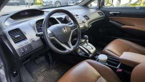 Grey Honda Civic 2010 in Vilnius, with an engine capacity of 1.40 L and mileage of 254 thousand km for 3300 €, photo 25 on AUTOMOTO.COM.LV