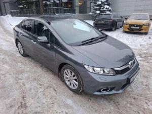 Grey Honda Civic 2012 in Vilnius, with an engine capacity of 1.80 L and mileage of 184 thousand km for 4900 €, photo 3 on AUTOMOTO.COM.LV