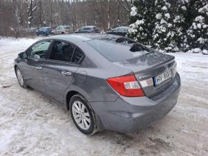 Grey Honda Civic 2012 in Vilnius, with an engine capacity of 1.80 L and mileage of 184 thousand km for 4900 €, photo 7 on AUTOMOTO.COM.LV
