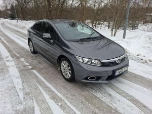 Grey Honda Civic 2012 in Vilnius, with an engine capacity of 1.80 L and mileage of 184 thousand km for 5200 €, photo 3 on AUTOMOTO.COM.LV