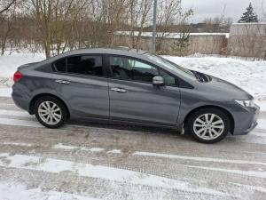 Grey Honda Civic 2012 in Vilnius, with an engine capacity of 1.80 L and mileage of 184 thousand km for 5200 €, photo 4 on AUTOMOTO.COM.LV