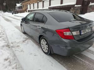 Grey Honda Civic 2012 in Vilnius, with an engine capacity of 1.80 L and mileage of 184 thousand km for 5200 €, photo 7 on AUTOMOTO.COM.LV