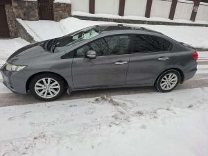 Grey Honda Civic 2012 in Vilnius, with an engine capacity of 1.80 L and mileage of 184 thousand km for 5200 €, photo 8 on AUTOMOTO.COM.LV