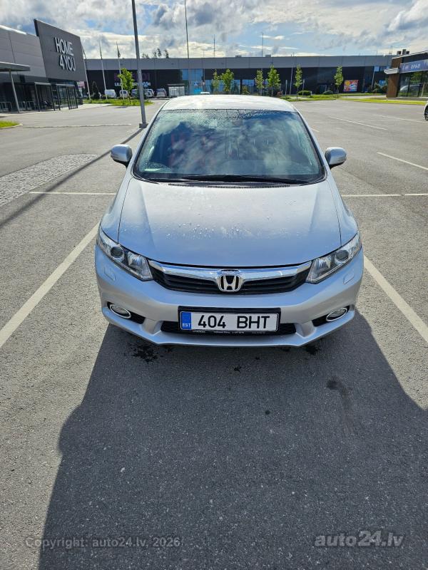 Grey Honda Civic 2013 in Tartu, with an engine capacity of 1.80 L and mileage of 107 thousand km for 7900 €, photo 3 on AUTOMOTO.COM.LV