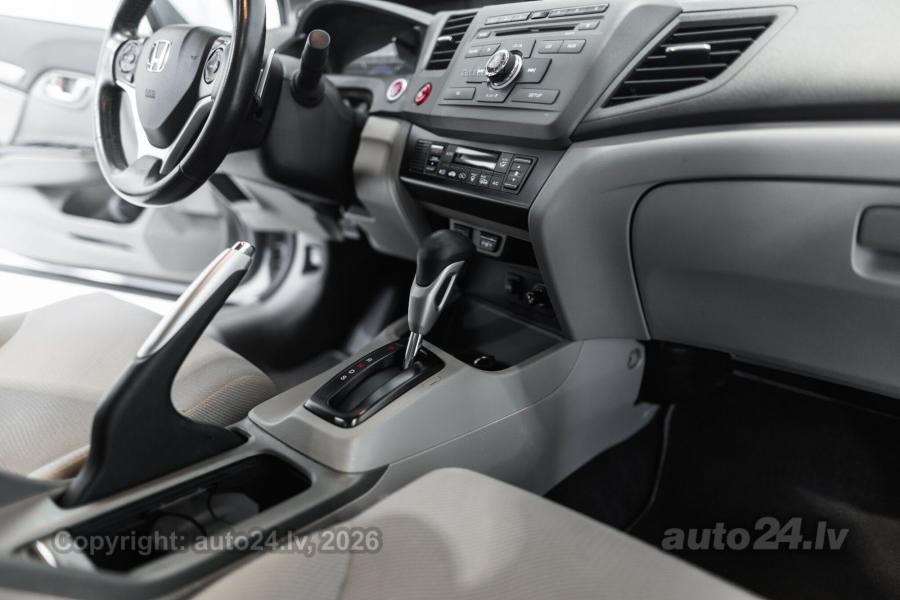 Grey Honda Civic 2013 in Tallinn, with an engine capacity of 1.80 L and mileage of 157 thousand km for 6990 €, photo 22 on AUTOMOTO.COM.LV