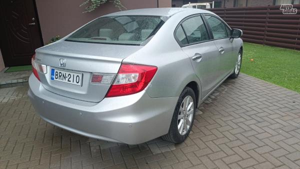 Pelēks Honda Civic 2014 Kauņa, ar dzinēja tilpumu 1.80 L un nobraukumu 95 tūkst. km par 7500 €, foto 6 vietnē AUTOMOTO.COM.LV