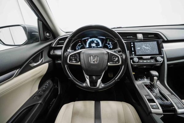 Grey Honda Civic 2018 in Tallinn, with an engine capacity of 1.50 L and mileage of 121 thousand km for 14500 €, photo 10 on AUTOMOTO.COM.LV