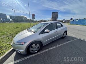Pelēks Honda Civic 2006 Rīga, ar dzinēja tilpumu 1.80 L un nobraukumu 156 tūkst. km par 3000 €, foto  vietnē AUTOMOTO.COM.LV