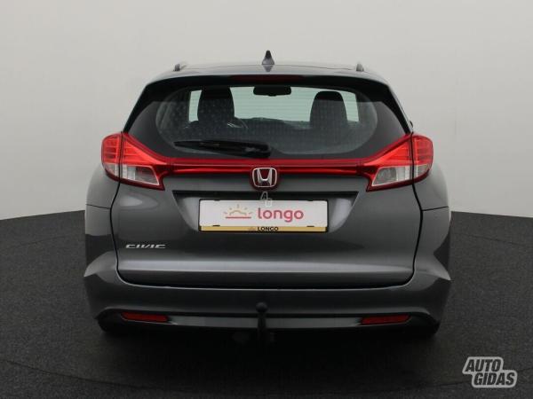 Grey Honda Civic 2014 in Vilnius, with an engine capacity of 1.60 L and mileage of 206 thousand km for 6799 €, photo 5 on AUTOMOTO.COM.LV