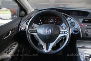 Orange Honda Civic 2009 in Tartu, with an engine capacity of 1.80 L and mileage of 210 thousand km for 2750 €, photo 11 on AUTOMOTO.COM.LV