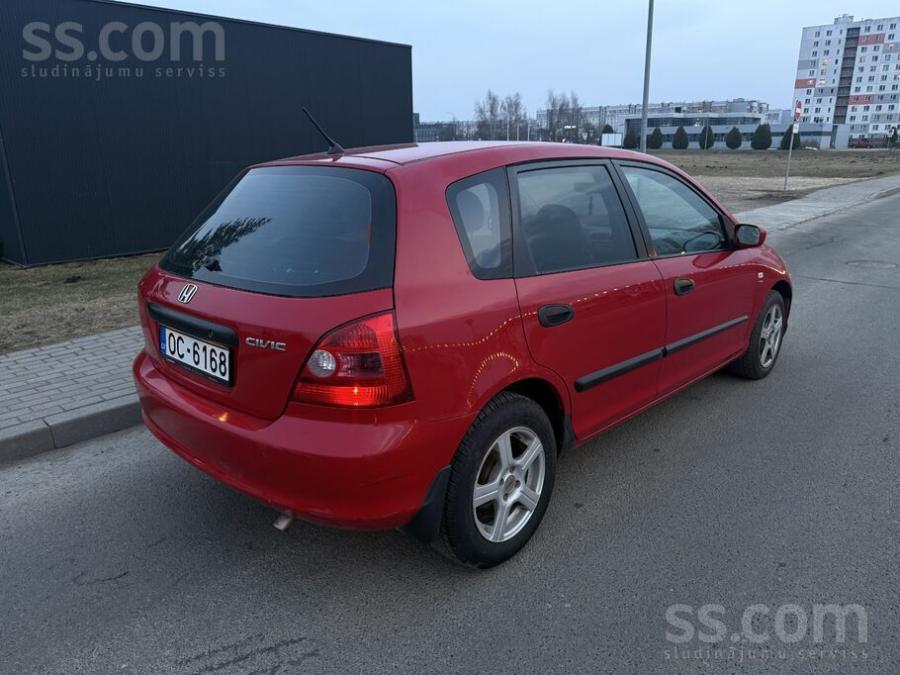 Red Honda Civic 2003 in Riga, with an engine capacity of 1.60 L and mileage of 294 thousand km for 310 €, photo 4 on AUTOMOTO.COM.LV