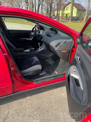 Red Honda Civic 2007 in Riga, with an engine capacity of 1.80 L and mileage of 304 thousand km for 1950 €, photo 9 on AUTOMOTO.COM.LV