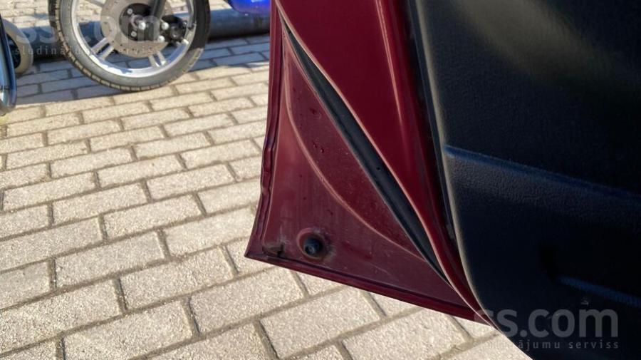 Sarkans Honda Civic 2007 Valmiera, ar dzinēja tilpumu 1.80 L un nobraukumu 272 tūkst. km par 1000 €, foto 8 vietnē AUTOMOTO.COM.LV