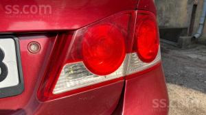 Sarkans Honda Civic 2007 Valmiera, ar dzinēja tilpumu 1.80 L un nobraukumu 272 tūkst. km par 1000 €, foto 16 vietnē AUTOMOTO.COM.LV