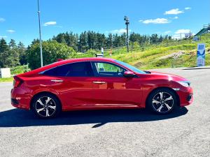 Red Honda Civic 2019 in Narva, with an engine capacity of 1.50 L and mileage of 188 thousand km for 12990 €, photo 5 on AUTOMOTO.COM.LV