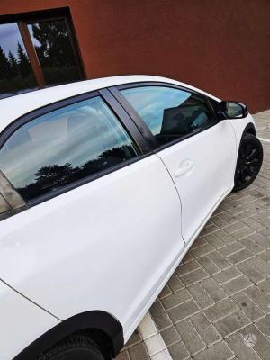 White Honda Civic 2012 in Kaisiadorys, with an engine capacity of 2.20 L and mileage of 245 thousand km for 5450 €, photo 24 on AUTOMOTO.COM.LV