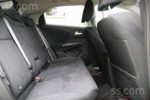 White Honda Civic 2014 in Riga, with an engine capacity of 1.60 L and mileage of 256 thousand km for 6995 €, photo 14 on AUTOMOTO.COM.LV