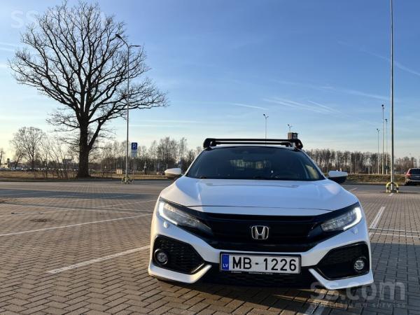 White Honda Civic 2019 in Riga, with an engine capacity of 1.00 L and mileage of 91 thousand km for 13700 €, photo 1 on AUTOMOTO.COM.LV