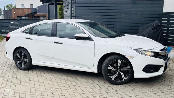 White Honda Civic 2018 in Vilnius, with an engine capacity of 1.50 L and mileage of 161 thousand km for 14000 €, photo 2 on AUTOMOTO.COM.LV