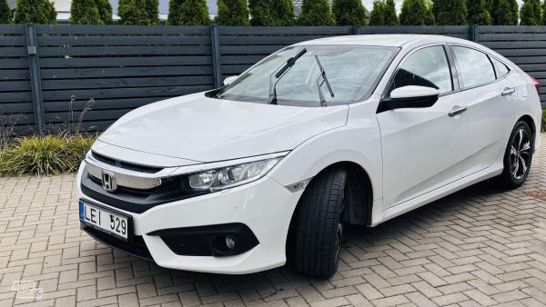 White Honda Civic 2018 in Vilnius, with an engine capacity of 1.50 L and mileage of 161 thousand km for 14000 €, photo 4 on AUTOMOTO.COM.LV